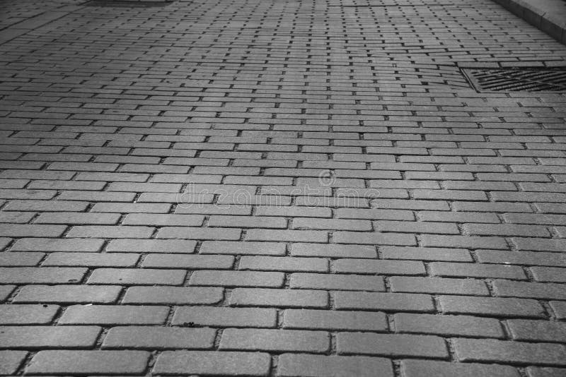 Gray Brick Stone Paved Road in Historic Square. Stock Image - Image of ...