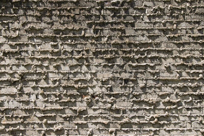 Gray Brick Wall with Weeping Mortar Wide View Stock Image - Image of ...