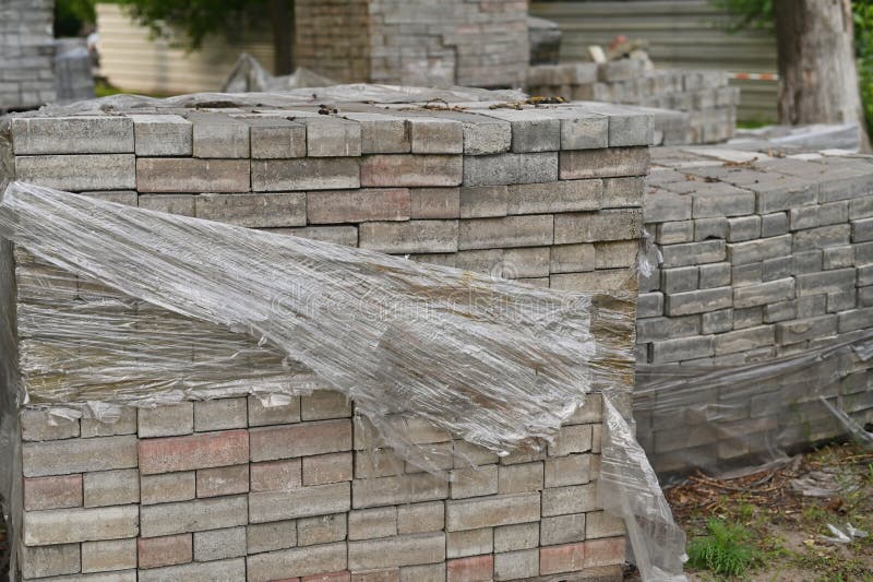 Gray Bricks are Stacked in Cubes on Pallets. Stock Photo - Image of ...