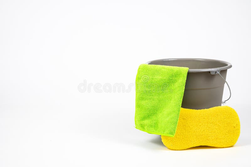 Gray Bucket with Yellow Sponge Stock Photo - Image of water, scour ...