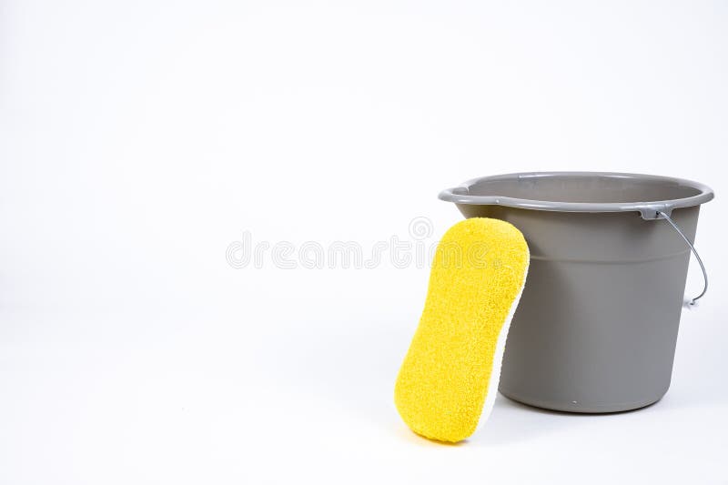 Gray Bucket with Yellow Sponge Stock Photo - Image of sponge, plastic ...