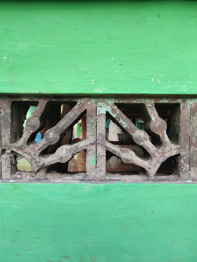 Gray Cement Block Air Ventilation Pattern with Green Wall Stock Photo ...