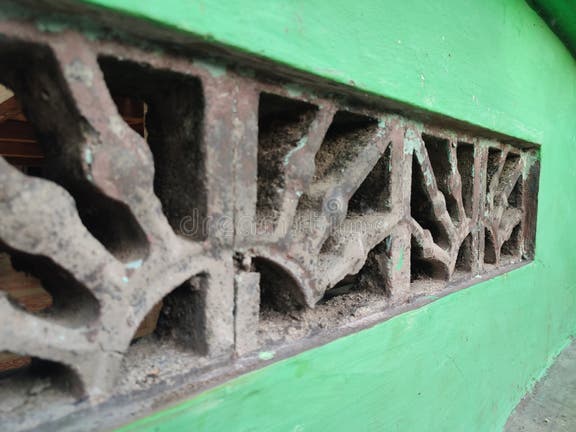 Gray Cement Block Air Ventilation Pattern with Green Wall Stock Photo ...