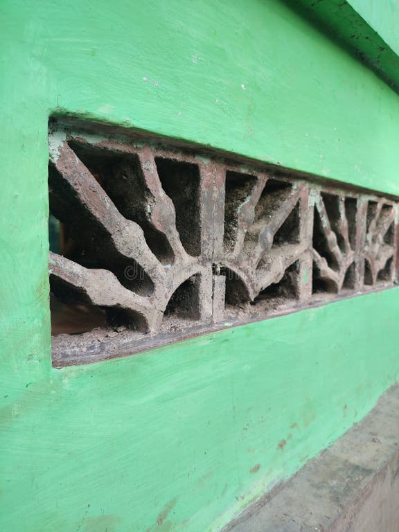 Gray Cement Block Air Ventilation Pattern with Green Wall Stock Image ...
