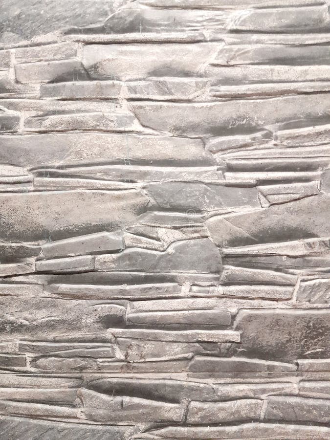 Gray Ceramic Wall with Embossed Stone Texture on the Wall of the House ...