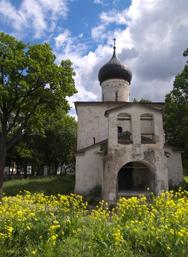Gray church in Pskov stock image. Image of building, flowers - 7195199