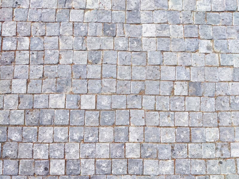 Gray Cobblestone Pavement with Uneven Texture in a Public Walkway ...