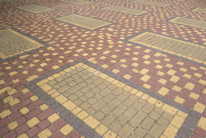 Pavement Tiles Lined with Geometric Patterns Stock Photo - Image of ...