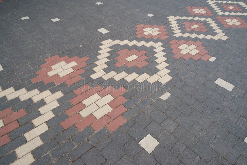 Pavement Tiles Lined with Geometric Patterns Stock Photo - Image of ...