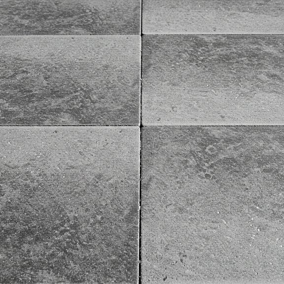Gray Concrete Paving Stones Arranged in a Grid Pattern Form a Flat ...