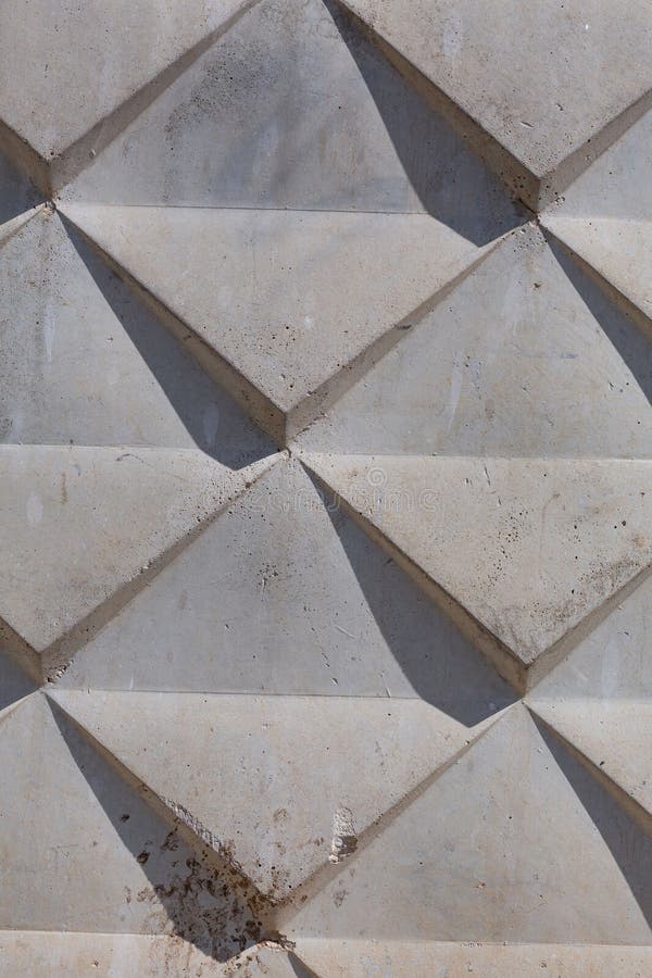 Bare Concrete Wall Fragment with Triangular Relief Shape Stock Photo ...