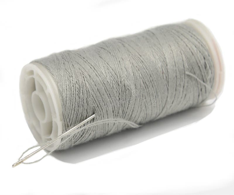 Gray Cotton Thread and Metal Needle, Needle Concept Stock Photo - Image ...