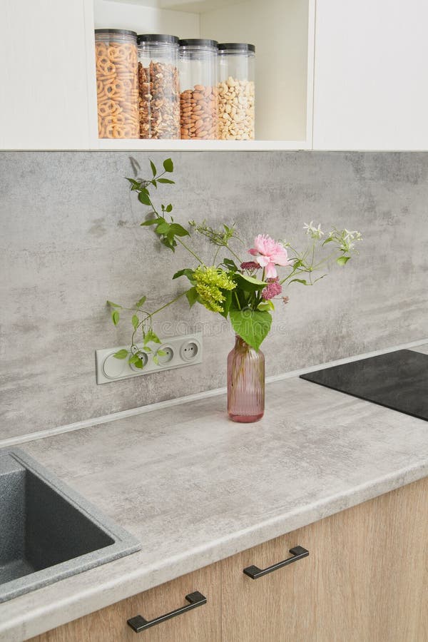 Gray Countertop and Splashback, Light Wood Kitchen Cabinets Stock Photo ...