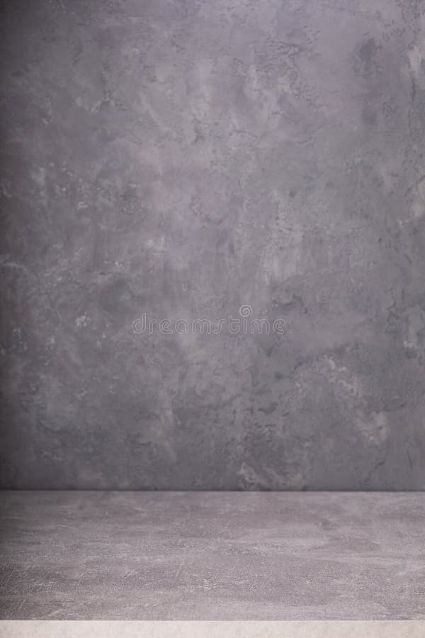 Gray Desk Table or Shelf Near Grey Concrete Wall Stock Image - Image of ...