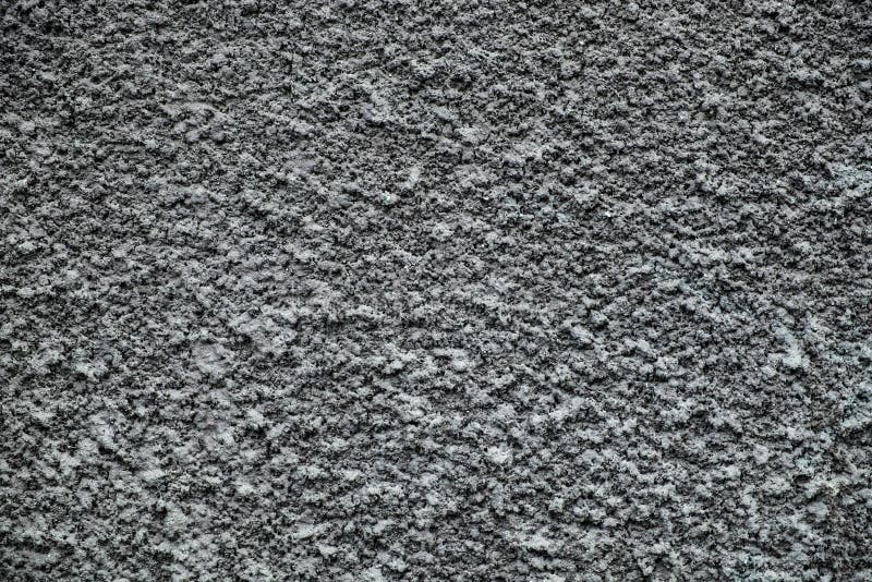 Gray Granular Concrete Wall with Dark Streaks of Paint and White Spots ...