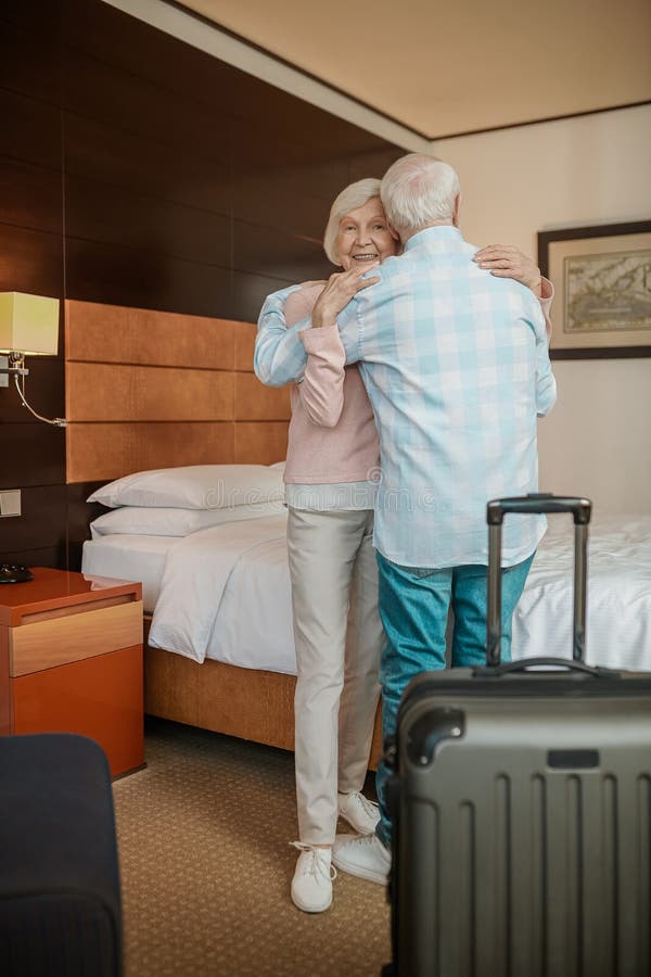 Gray-haired Couple Embracing and Feeling Happy Stock Photo - Image of ...