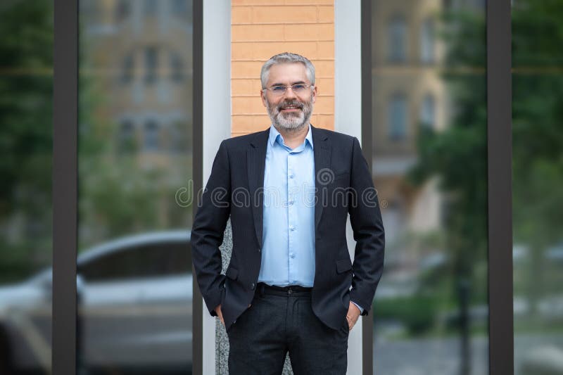 Gray-haired Man in a Suit Looking Determined Stock Image - Image of ...