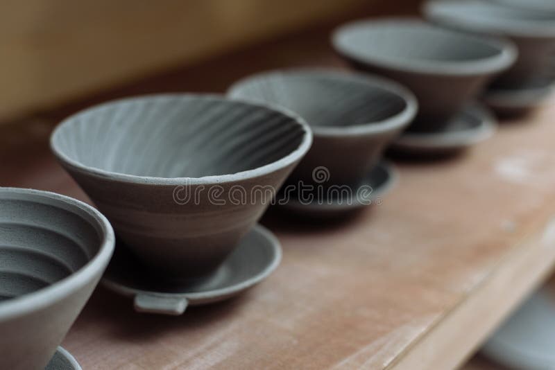 Gray Handmade Ceramic Plates. Glazed Clay Plates in a Pottery Workshop ...