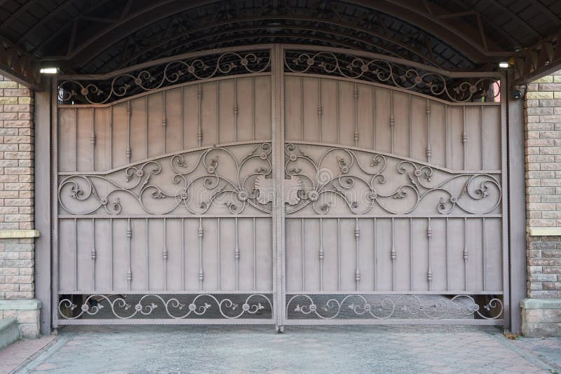 Gray Iron Gates with Decorative Elements Stock Image - Image of entry ...