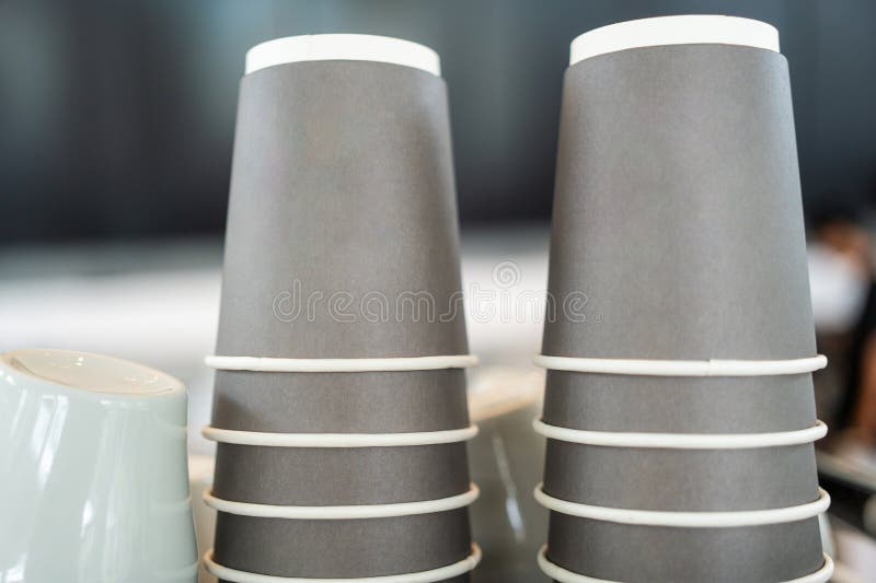 Gray Kraft Paper Coffee Cups on the Coffee Machine in the Coffee Shop ...