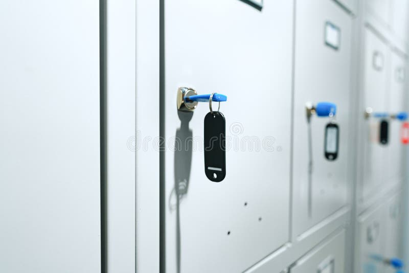 Gray Locker with Key for Safety in Public Facility Close Up Stock Image ...