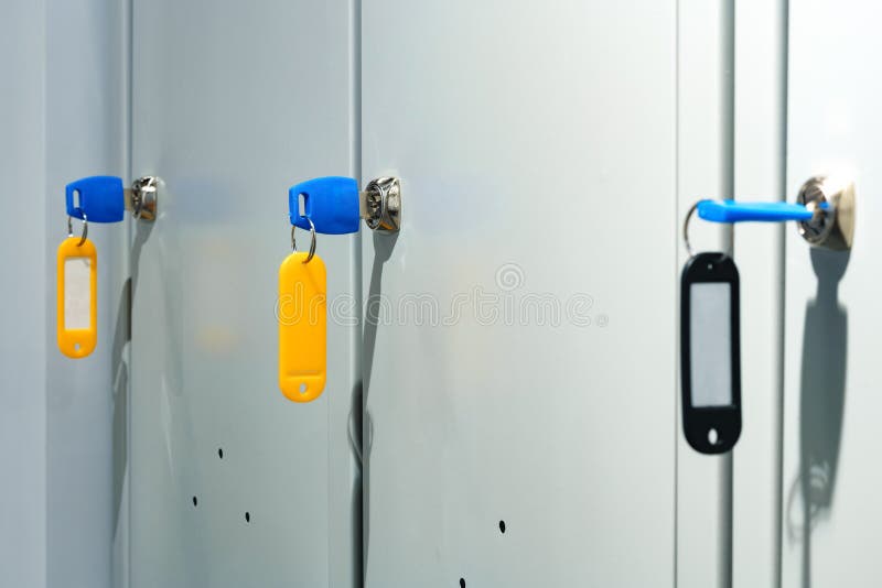 Gray Locker with Key for Safety in Public Facility Close Up Stock Photo ...
