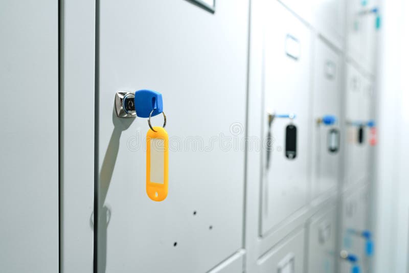 Gray Locker with Key for Safety in Public Facility Close Up Stock Photo ...