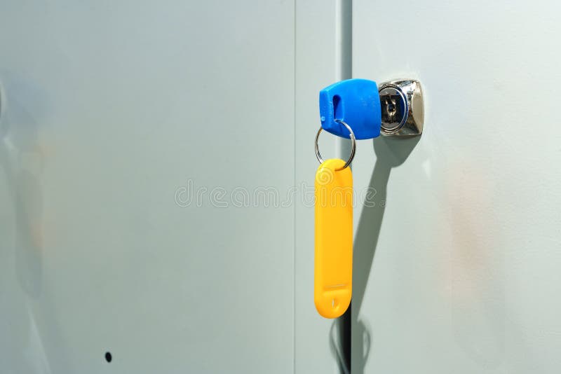 Gray Locker with Key for Safety in Public Facility Close Up Stock Photo ...