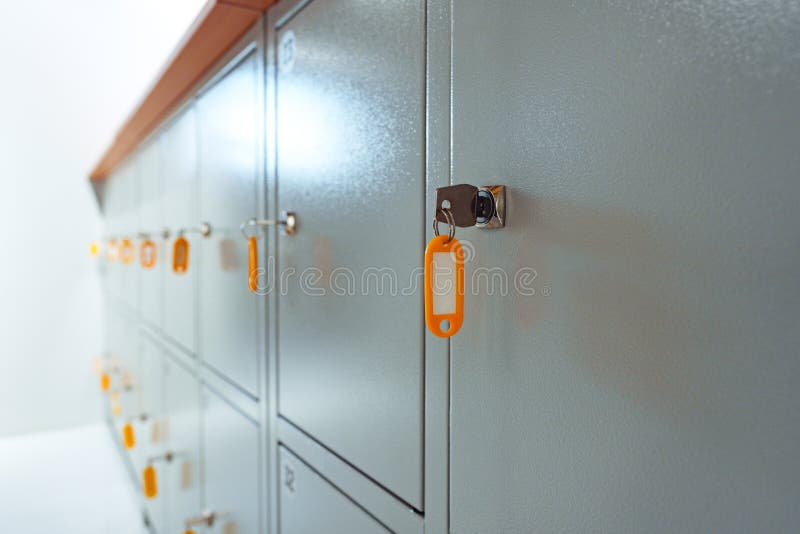 Gray Locker with Key for Safety in Public Facility Close Up Stock Image ...