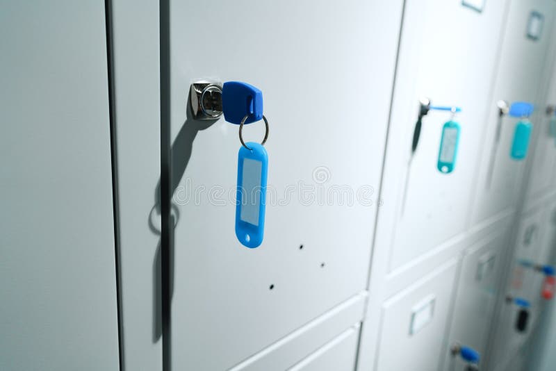 Gray Locker with Key for Safety in Public Facility Close Up Stock Image ...