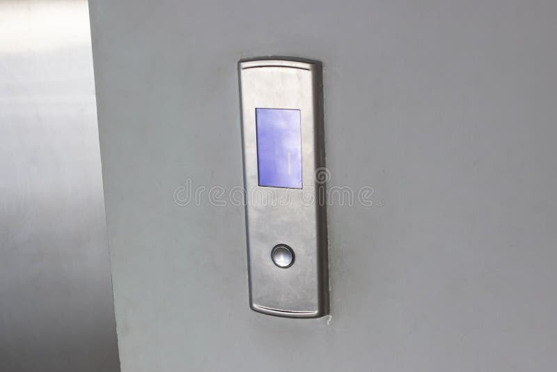 Gray Metal Elevator Button on the Wall Closeup Stock Photo - Image of ...
