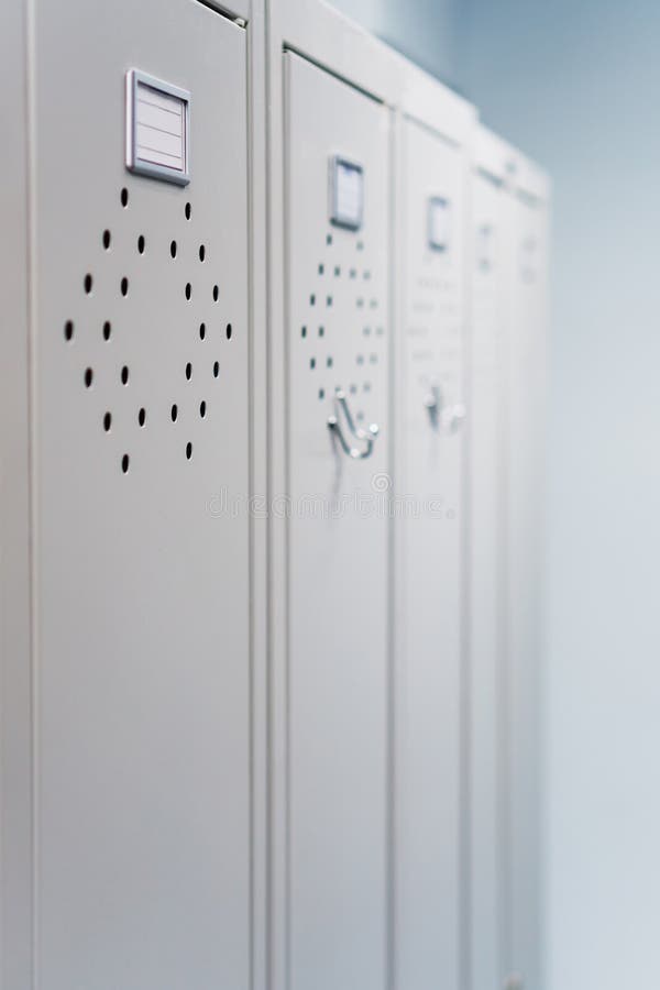 Gray Metal Lockers in the Dressing Room for Clothes in a Row Stock ...