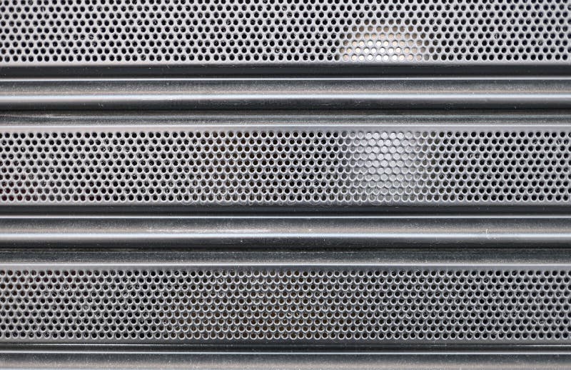 Gray Metal Shutter of a Store or Establishment with Many Holes Stock ...