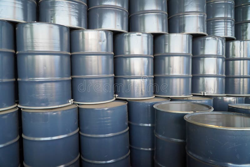 Gray Oil Drums Stacked in a Warehouse.Industrial Background Stock Photo ...