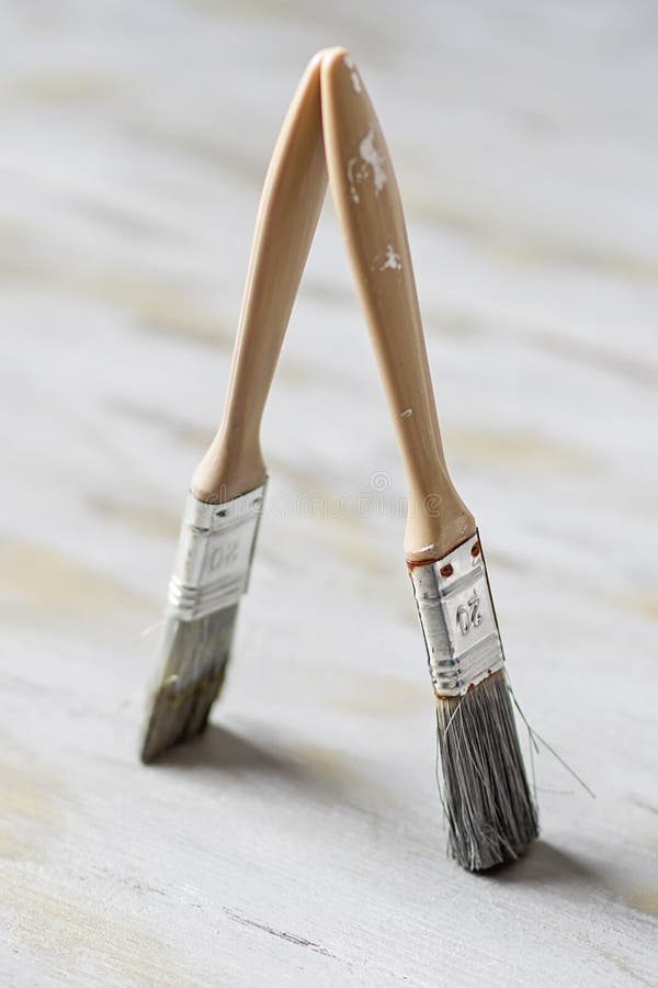 Gray paint brushes stock image. Image of finished, artist - 234947817