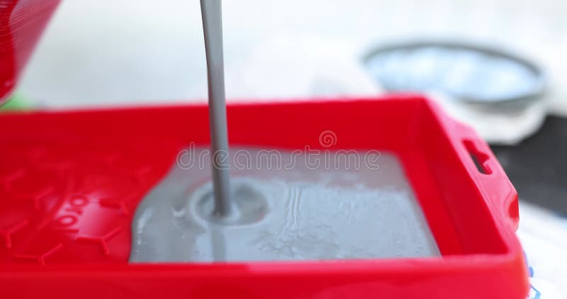 Gray Paint is Poured into Red Construction Container Stock Video ...