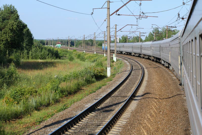 Gray Passenger Train Turning on the Stock Photo - Image of motion ...