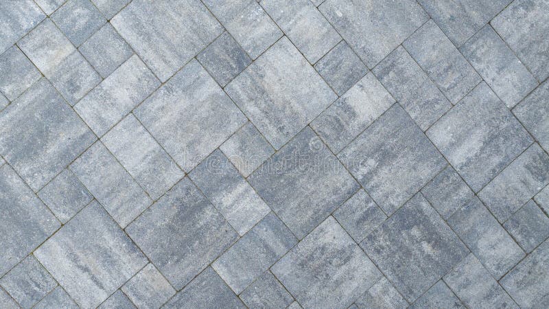 Gray Paved Surface with Herringbone Pattern in Natural Light Stock ...