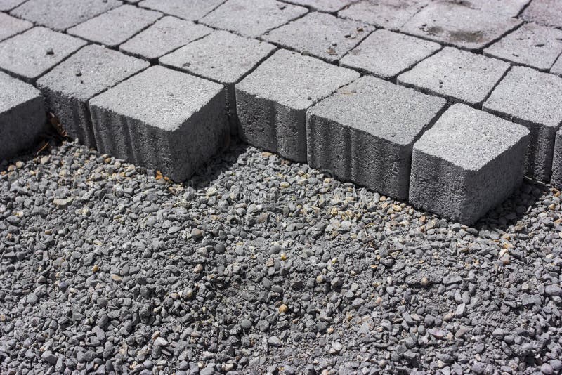 Gray Paving Slabs in the Process Stock Photo - Image of brick, ground ...
