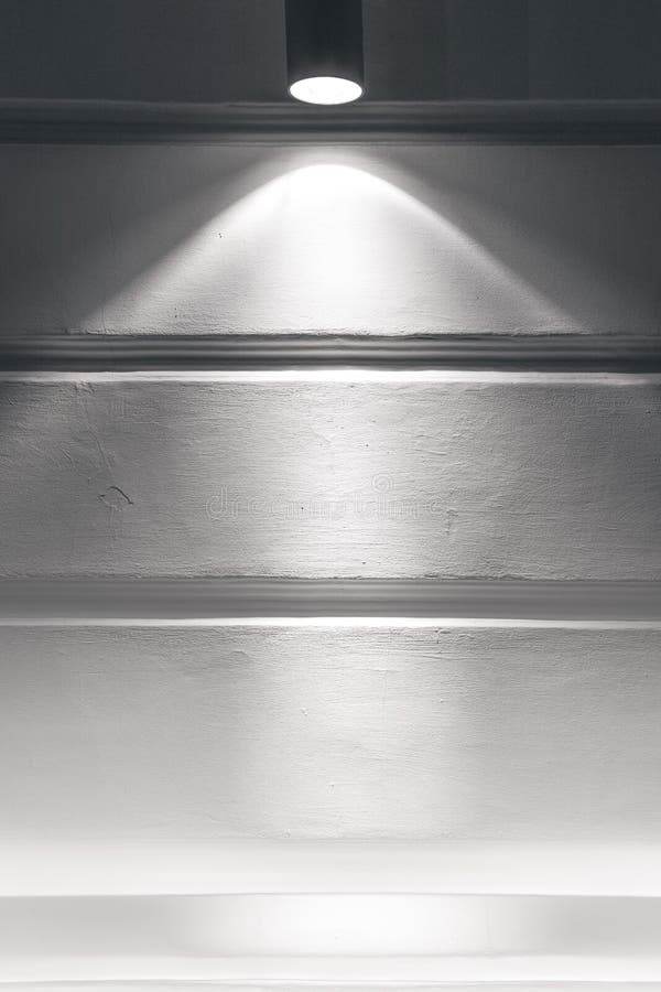 Gray Plastered Wall with a Beam of Light from the Spotlight. Stock ...