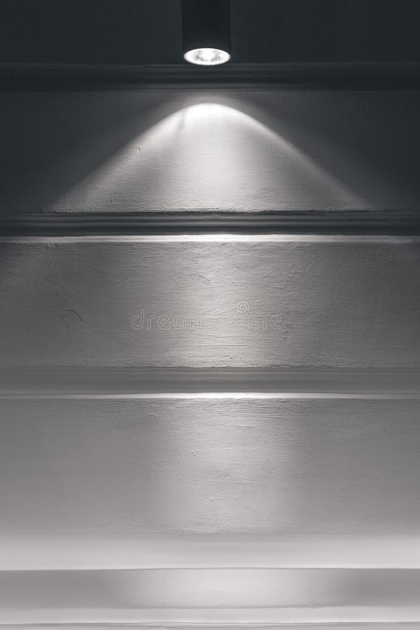 Gray Plastered Wall with a Beam of Light from the Spotlight. Stock ...