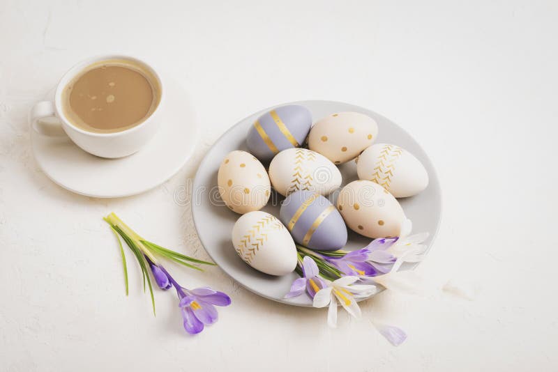 Gray Plate with Painted Easter Eggs, Coffee Cup and Crocus Flowers on ...