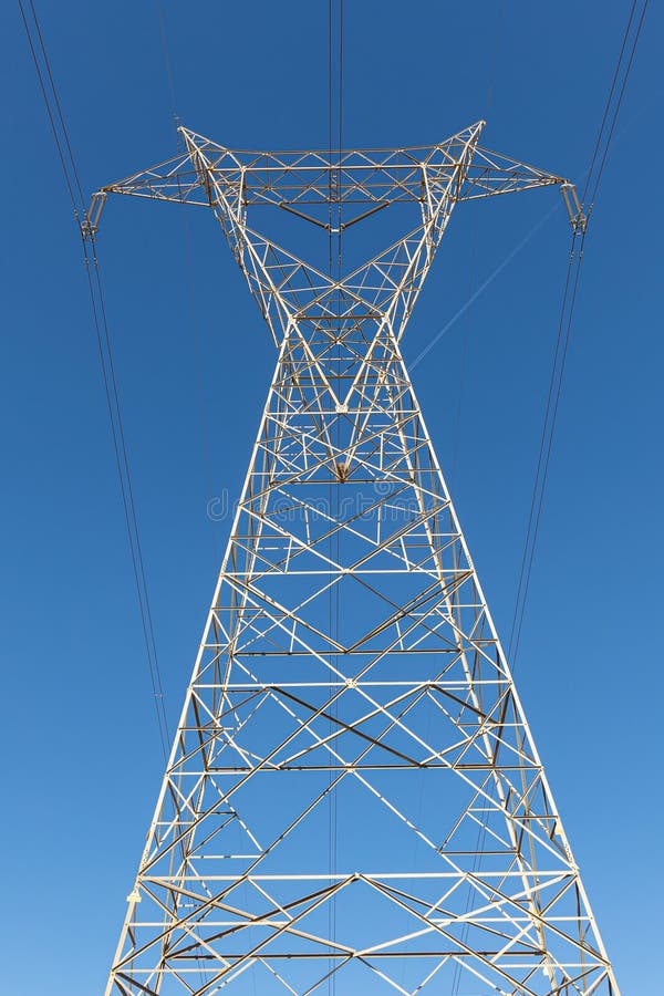 Gray Power Line is on the Blue Sky Background. Vertical Stock Image ...
