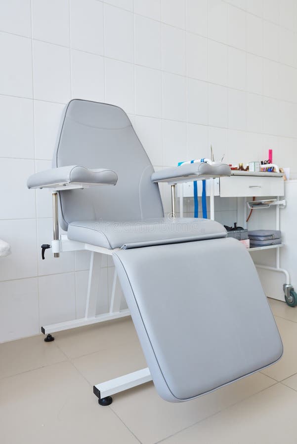 Gray Procedure Chair in the Clinic Stock Image - Image of chair ...