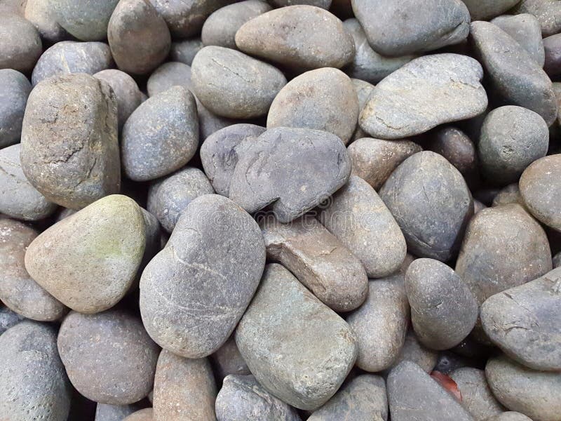 Gray River Rocks stock photo. Image of round, pebbles - 301930442