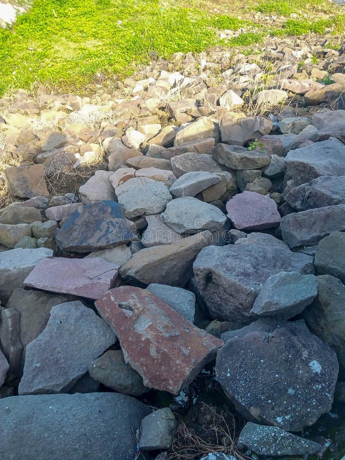 Gray Rock on the Edge of the Grass Stock Photo - Image of nature, grey ...