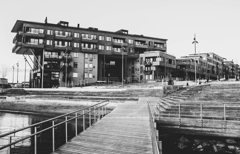 Gray Scale Photo of a Dock Near a Building Stock Image - Image of ...