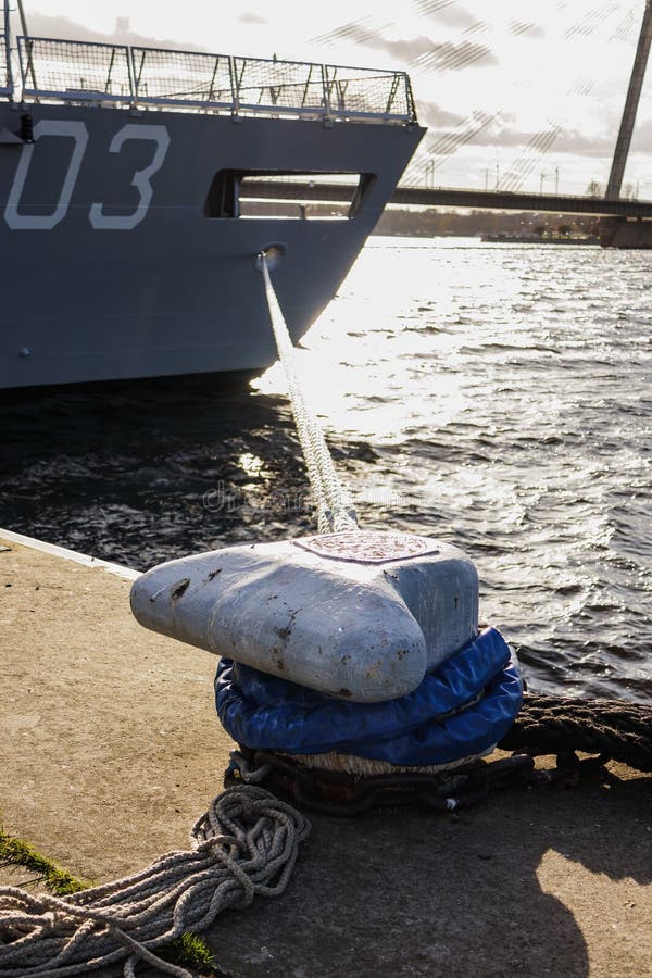 A Gray Ship with a Long Rope is Moored in the Harbor Stock Image ...