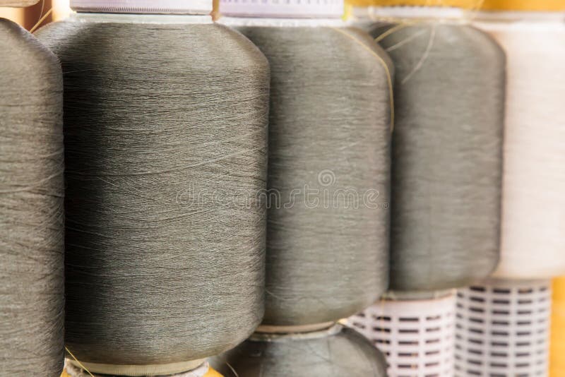 Gray silk thread in spool stock photo. Image of spool - 29167586