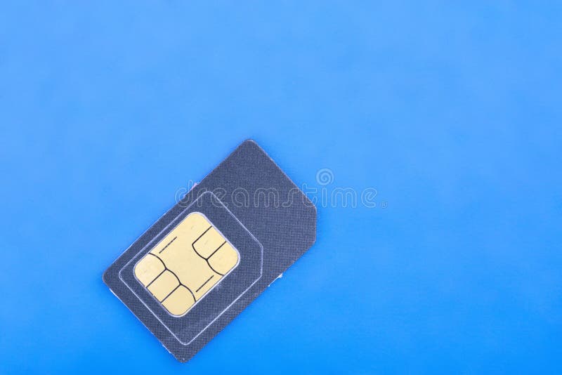 The Gray SIM Card of the Large Factor Forms is on a Blue Background ...